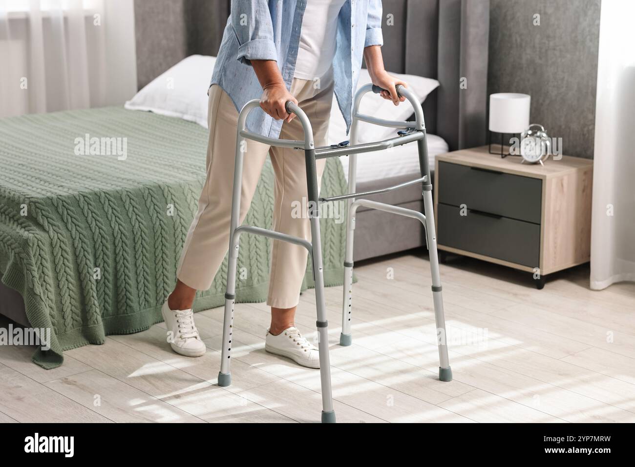 Person with walker at home closeup hi-res stock photography and images ...