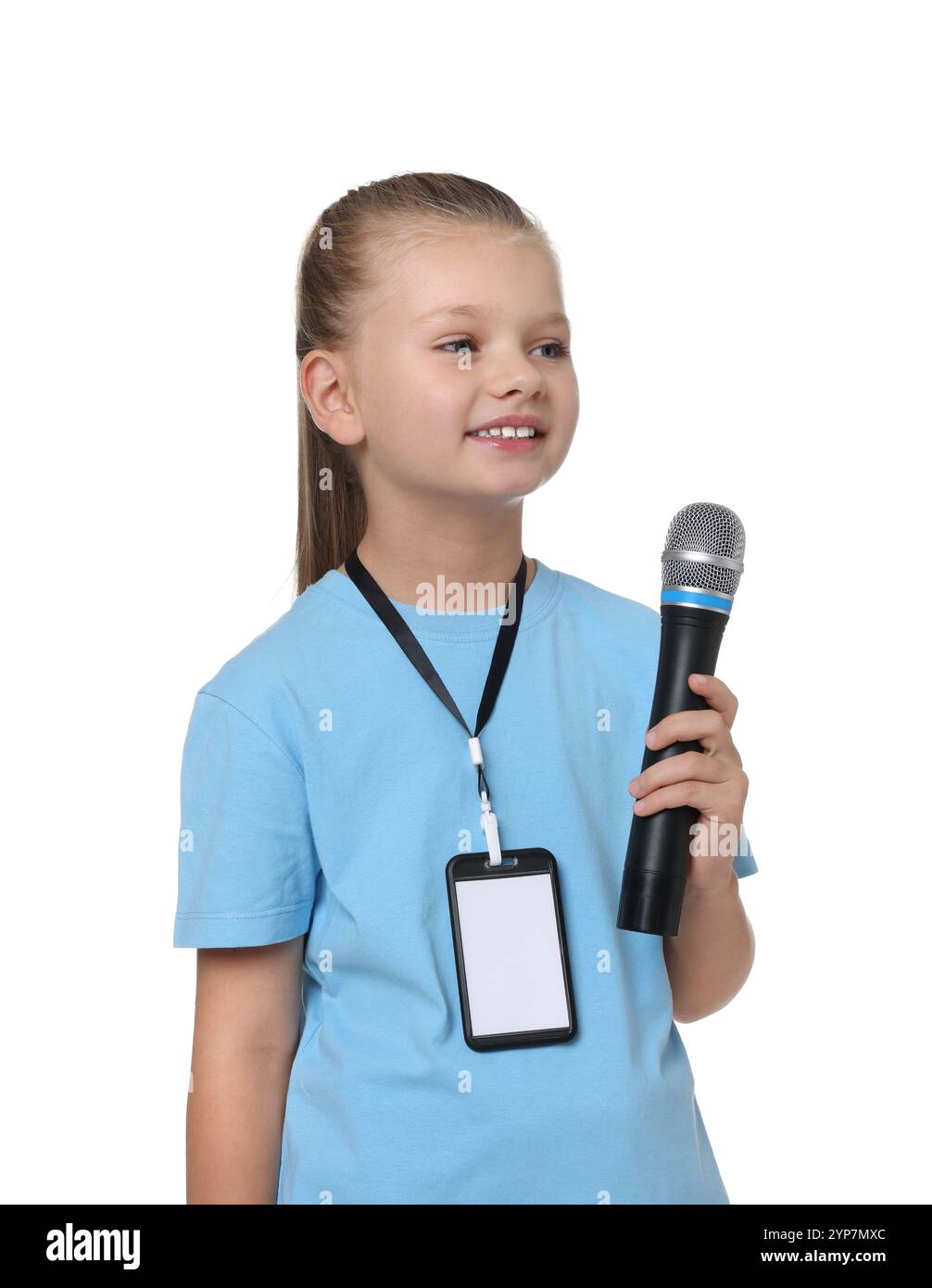 Little girl with microphone pretending to be journalist on white ...
