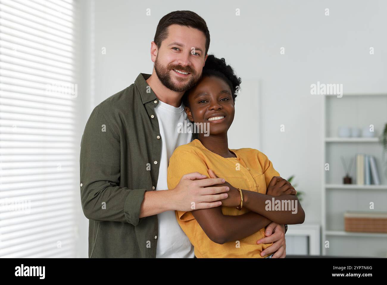 International relationships. Portrait of lovely couple at home Stock ...