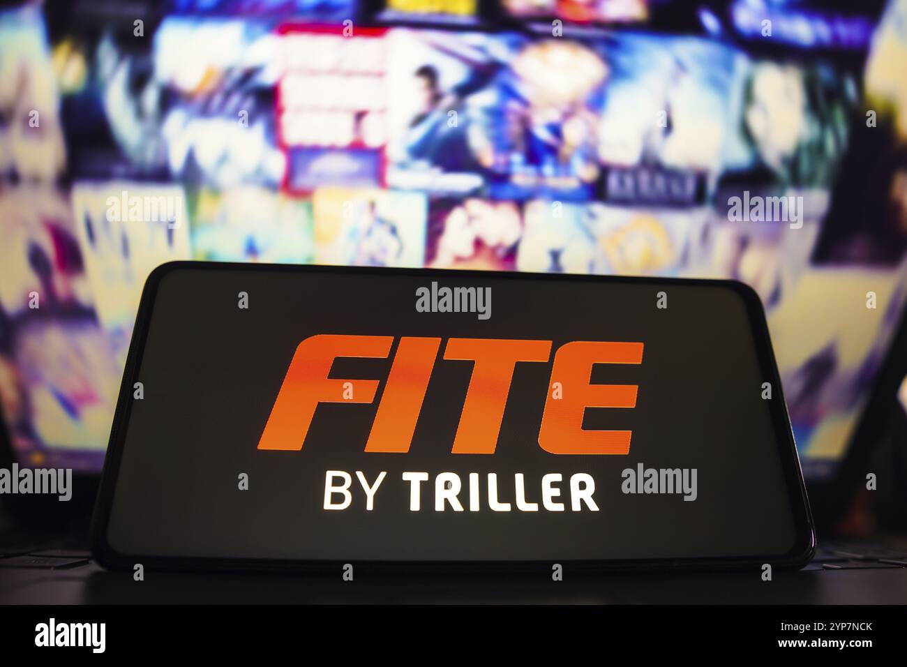 In this photo illustration, the FITE logo is displayed on a smartphone ...