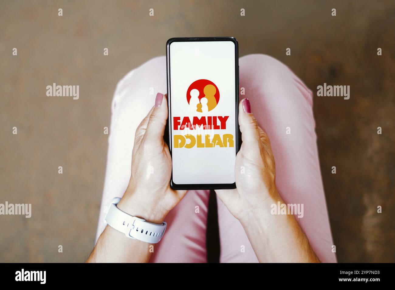 In this photo illustration, the Family Dollar Stores logo app is seen ...