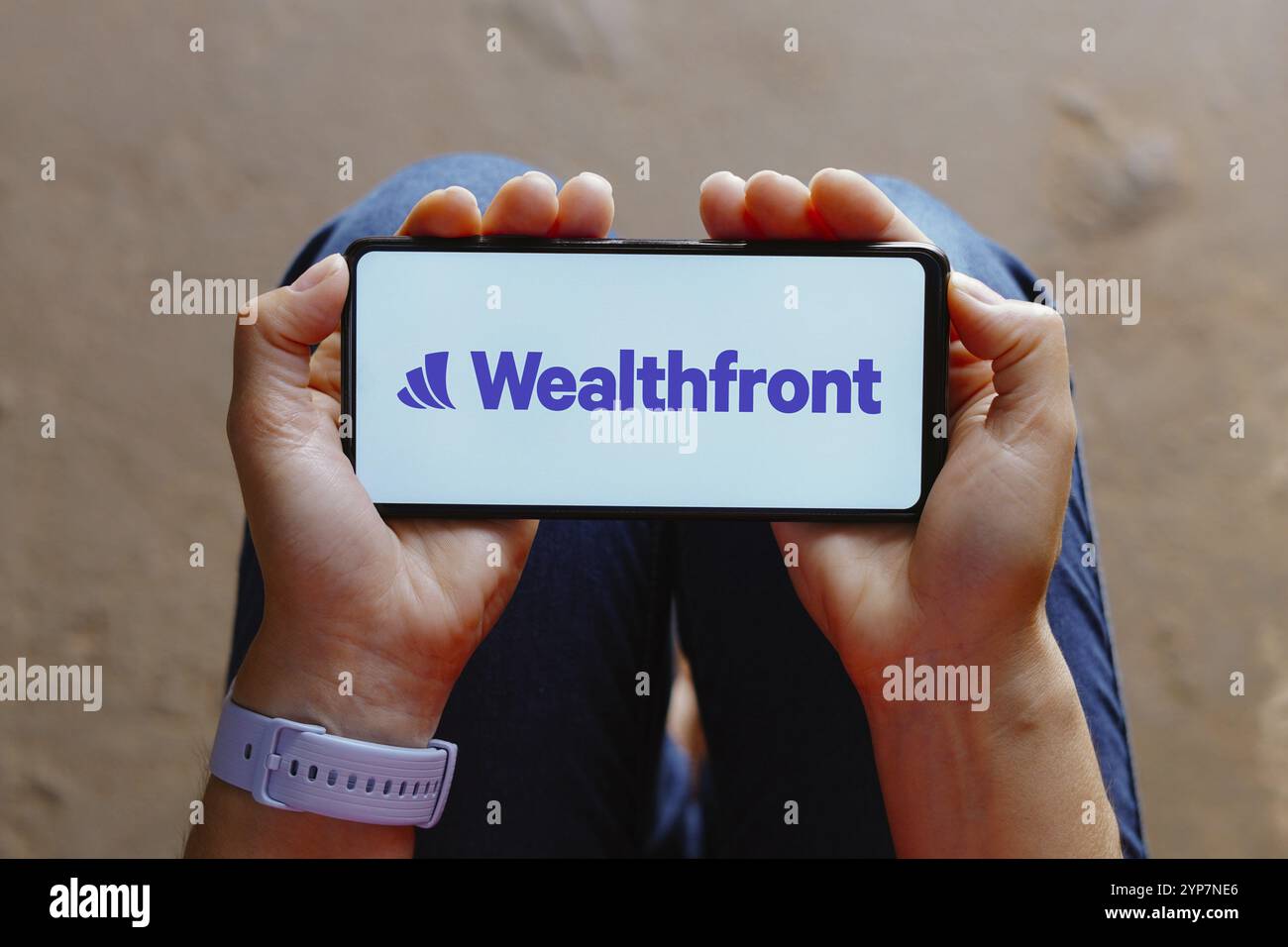 In this photo illustration, the Wealthfront logo is displayed on a ...