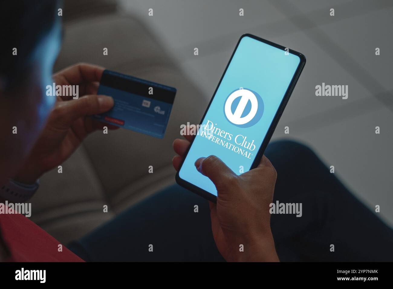 In this photo illustration, the Diners Club International logo is ...