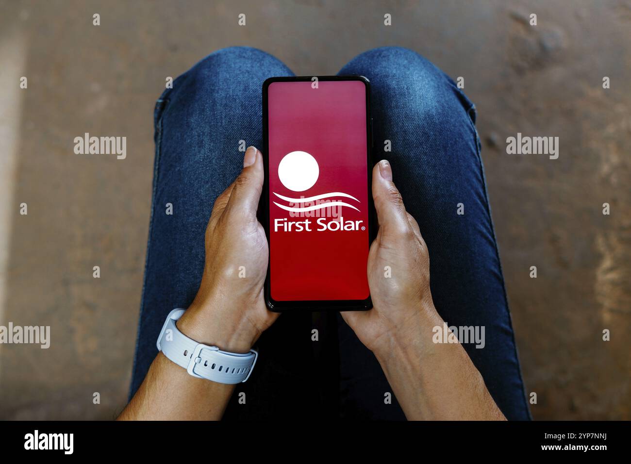 In this photo illustration, the First Solar logo is displayed on a ...