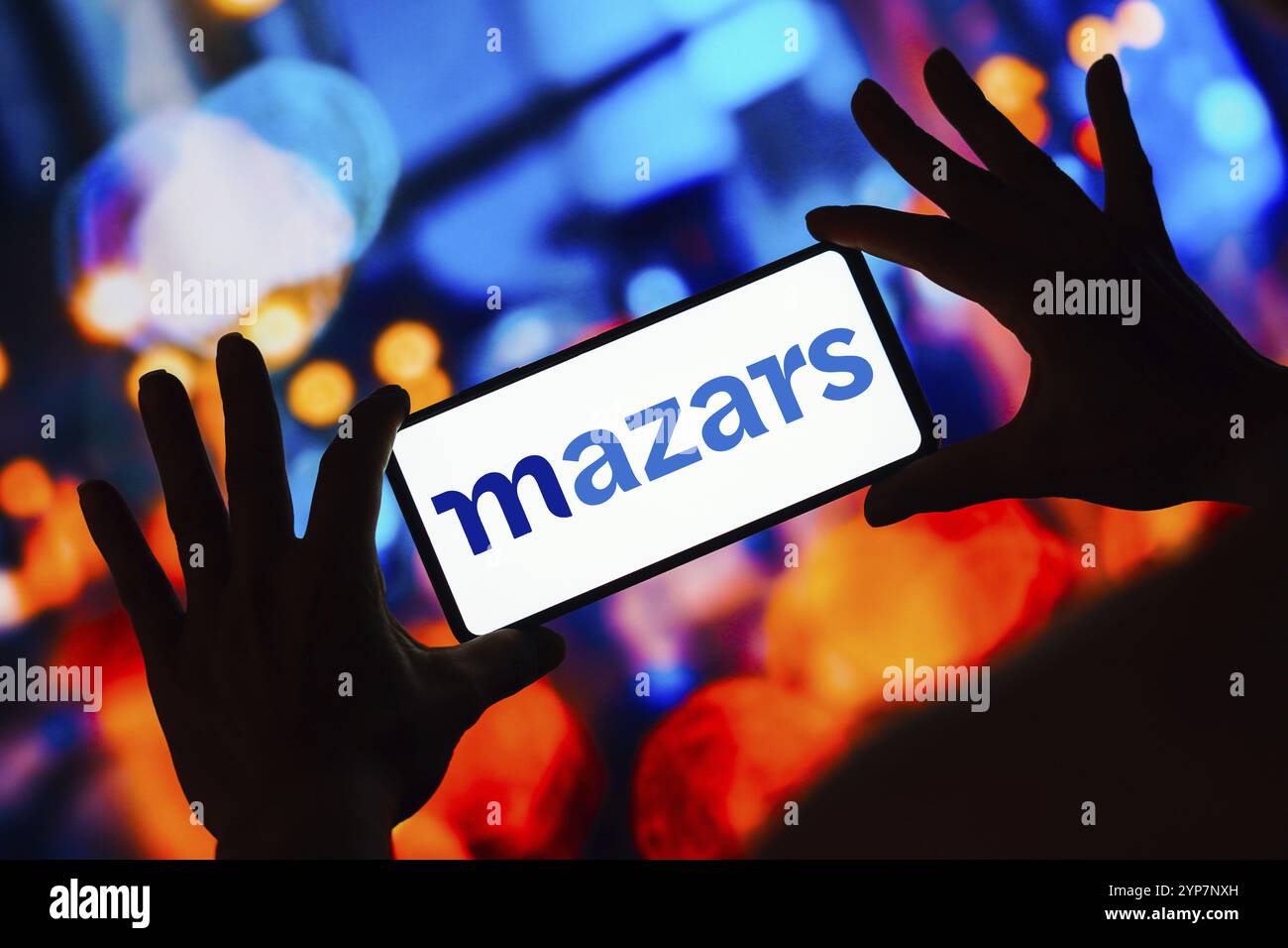 In this photo illustration, the Mazars logo is displayed on a ...