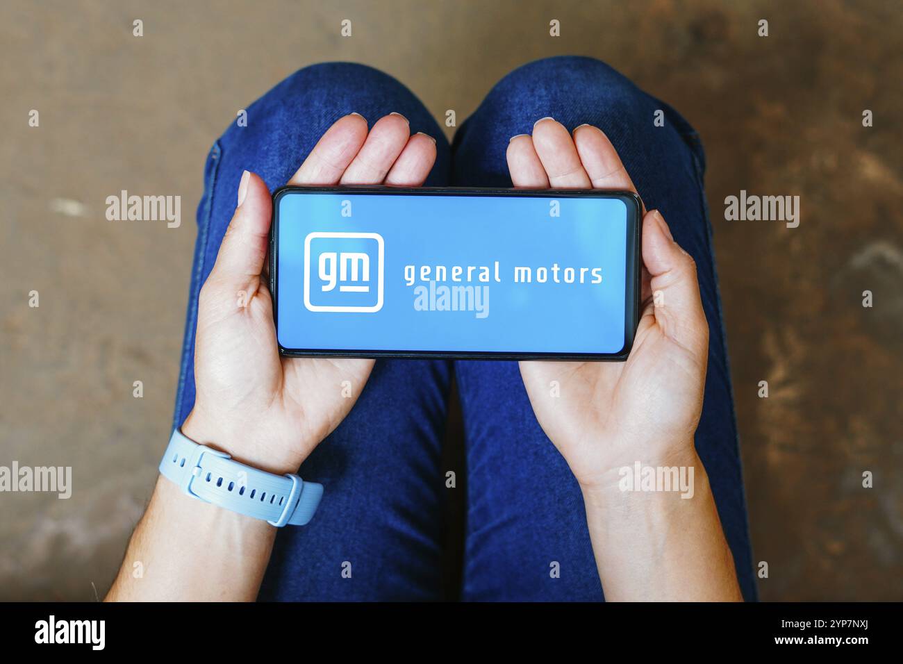 In this photo illustration, the General Motors Company (GM) logo is ...