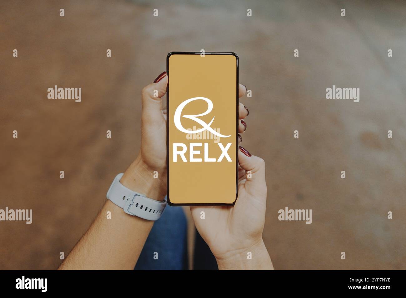 In this photo illustration, the RELX Group logo is displayed on a ...