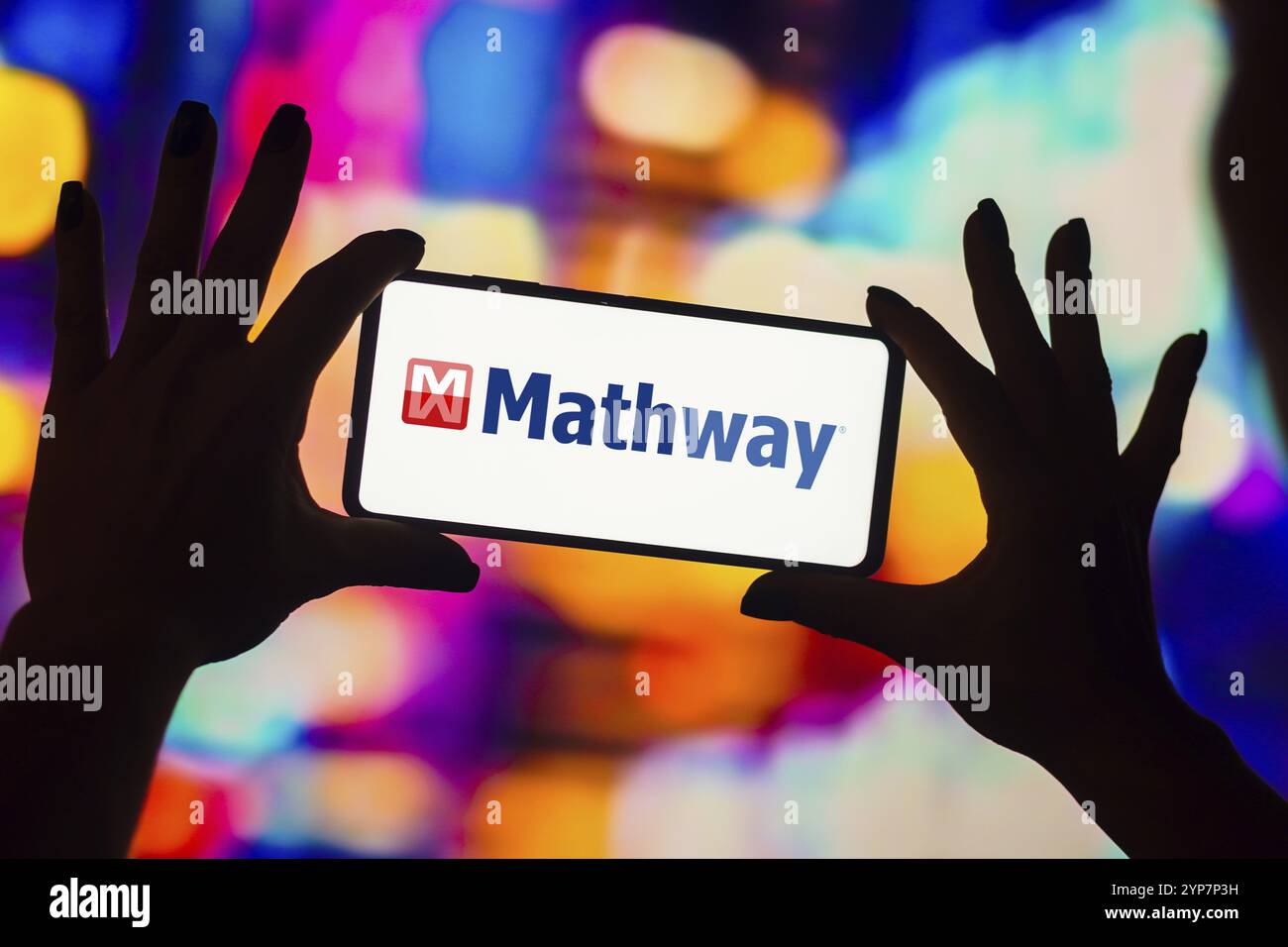 In this photo illustration, the Mathway logo is displayed on a ...