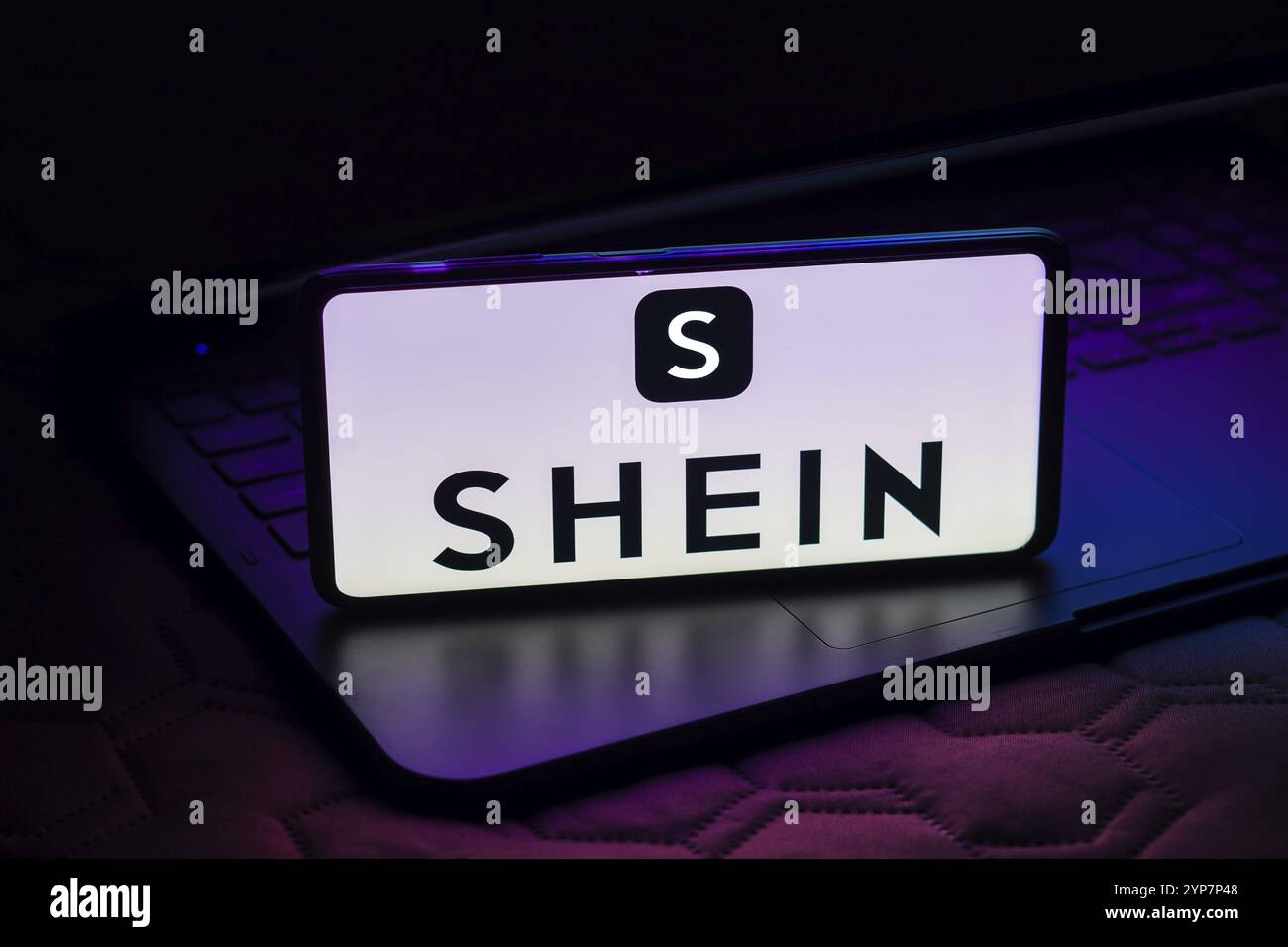 In this photo illustration, the Shein logo is displayed on a smartphone ...
