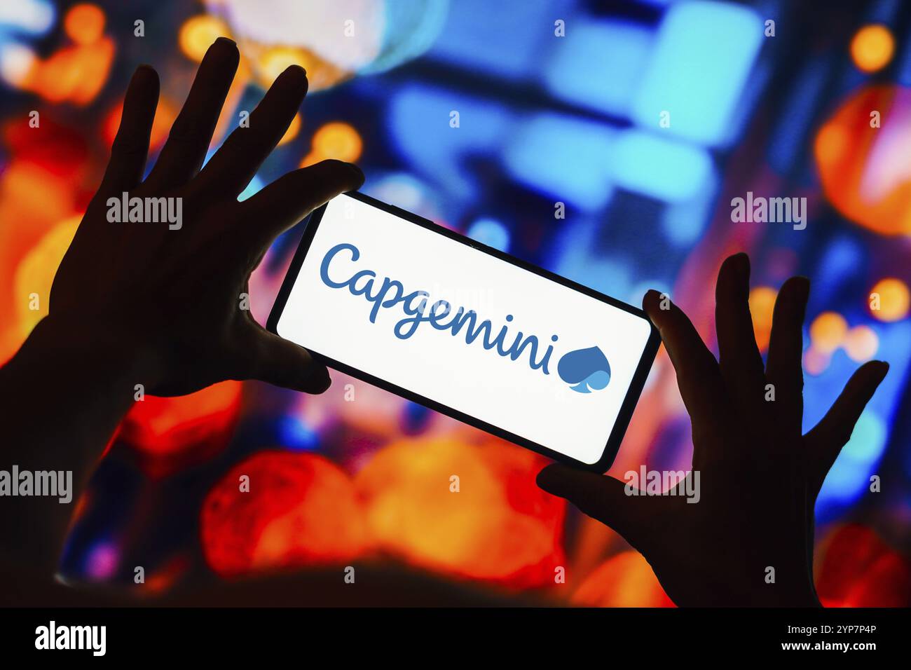 In this photo illustration, the Capgemini logo is displayed on a ...