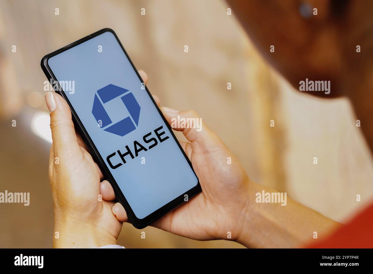 In this photo illustration, the Chase Bank logo is displayed on a ...