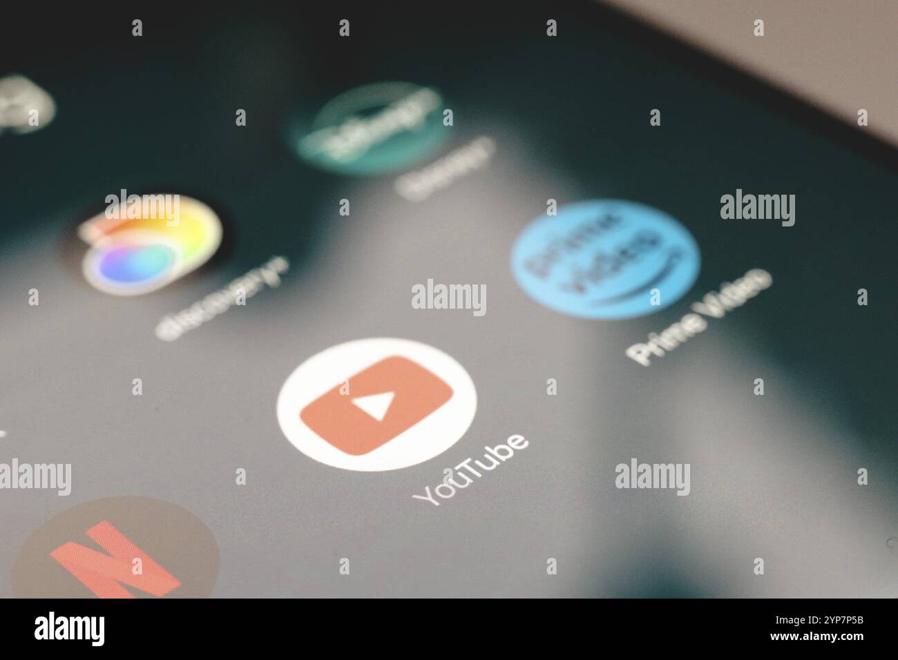 In this photo illustration, the app logo Netflix, YouTube and Prime ...