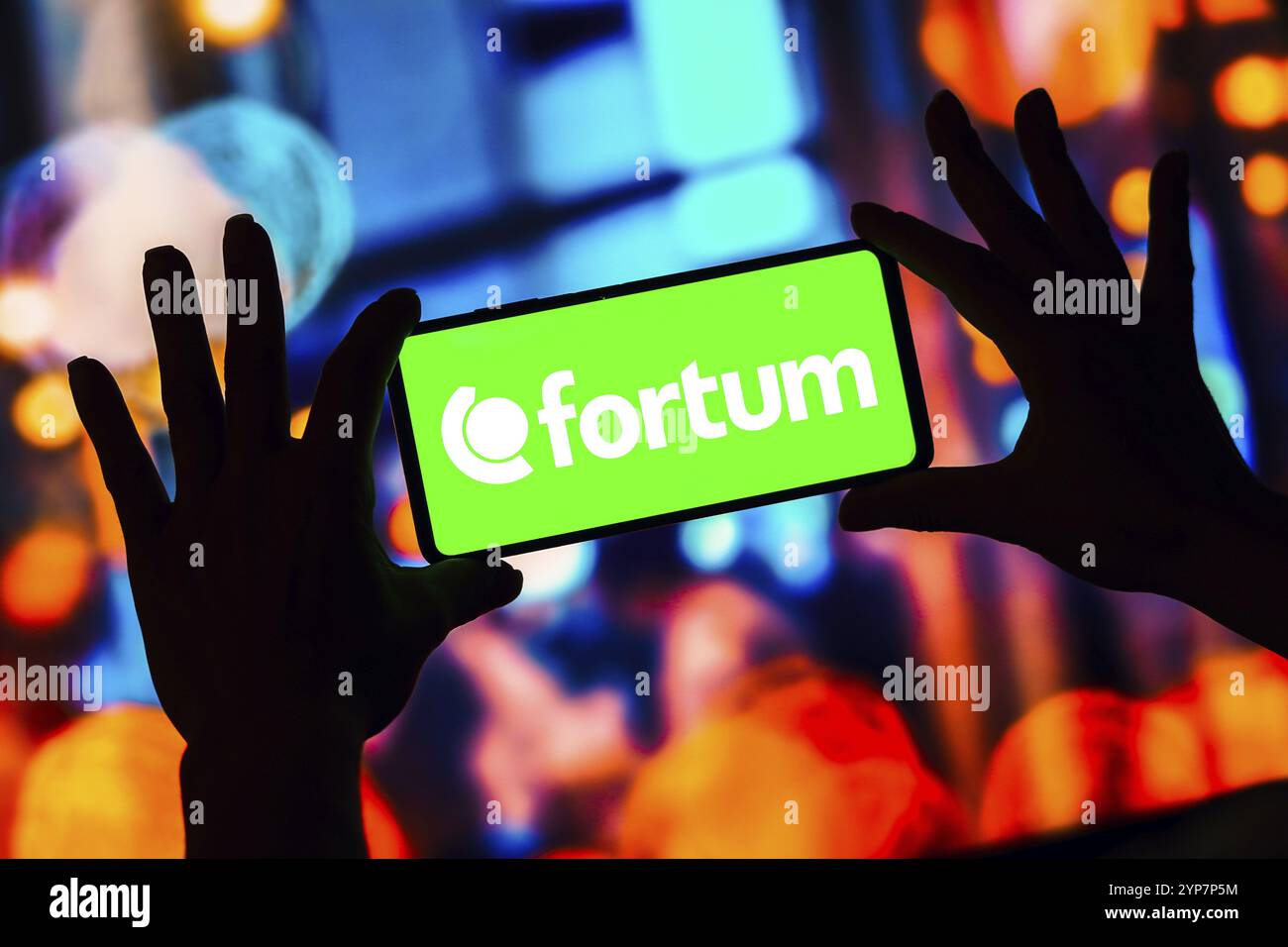In this photo illustration, the Fortum logo is seen displayed on a ...