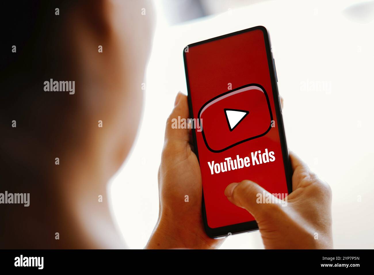 In this photo illustration, the YouTube Kids logo is displayed on a ...
