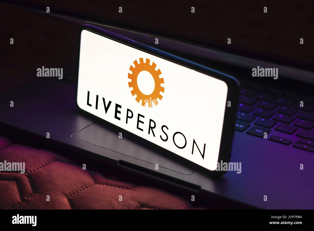 In this photo illustration, the LivePerson logo is displayed on a ...