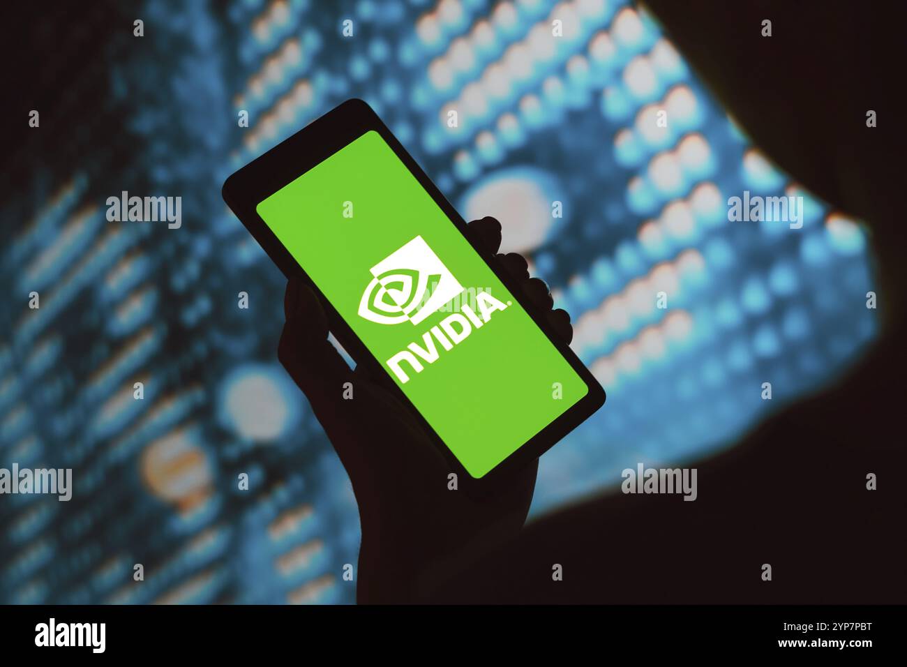 In this photo illustration, the Nvidia Corporation logo is displayed on ...