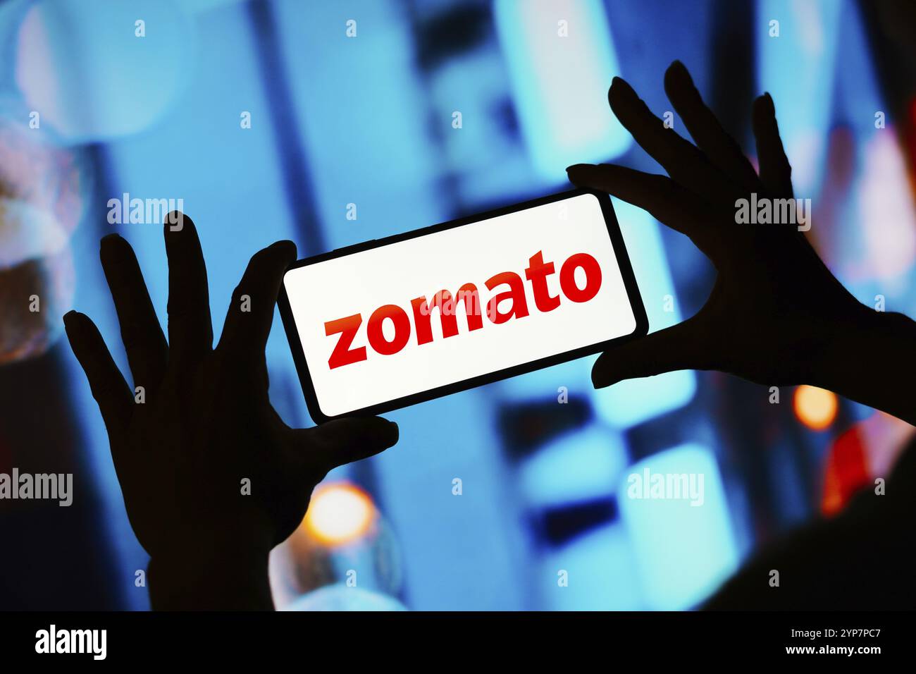 In this photo illustration, the Zomato logo seen displayed on a ...