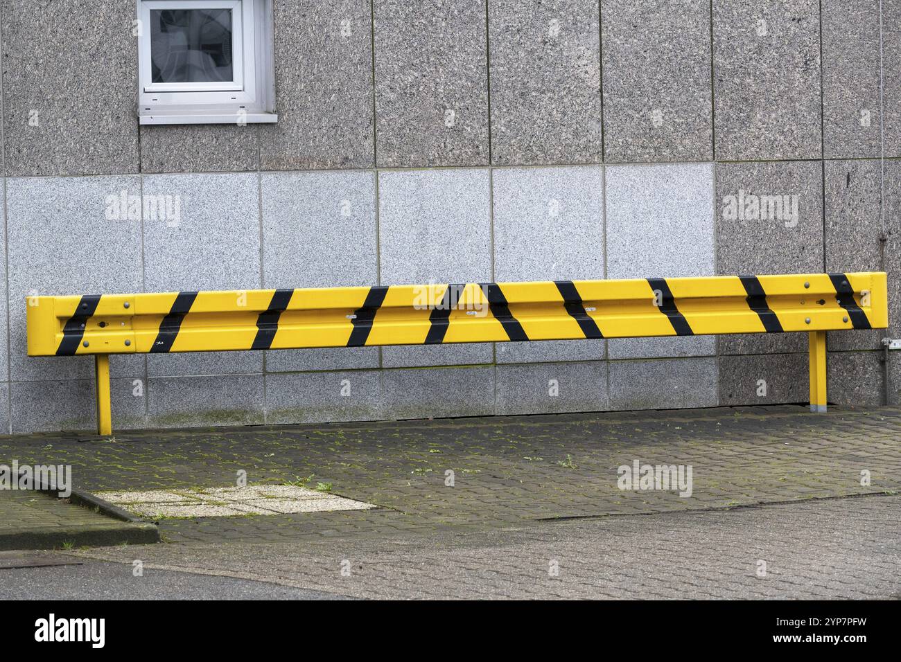Guardrail on a house in black and yellow Stock Photo - Alamy