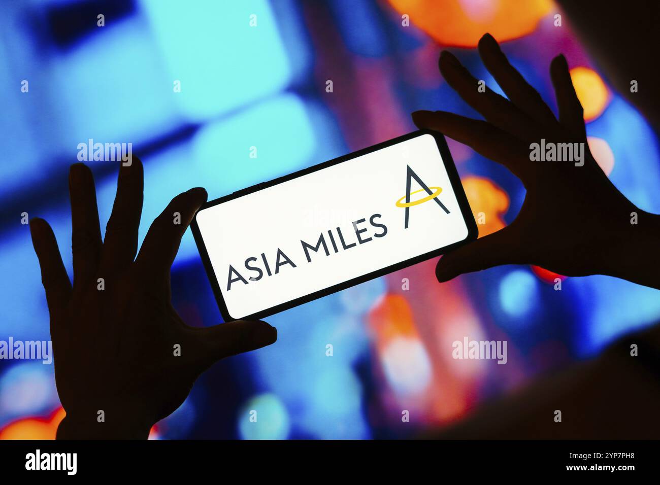 In this photo illustration, the Asia Miles (Cathay Pacific) logo seen ...