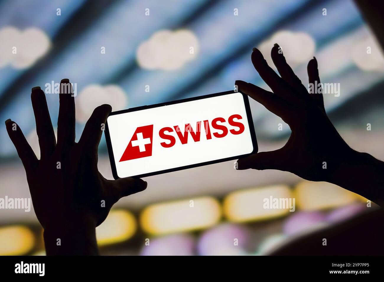 In this photo illustration, the Swiss International Air Lines logo is ...