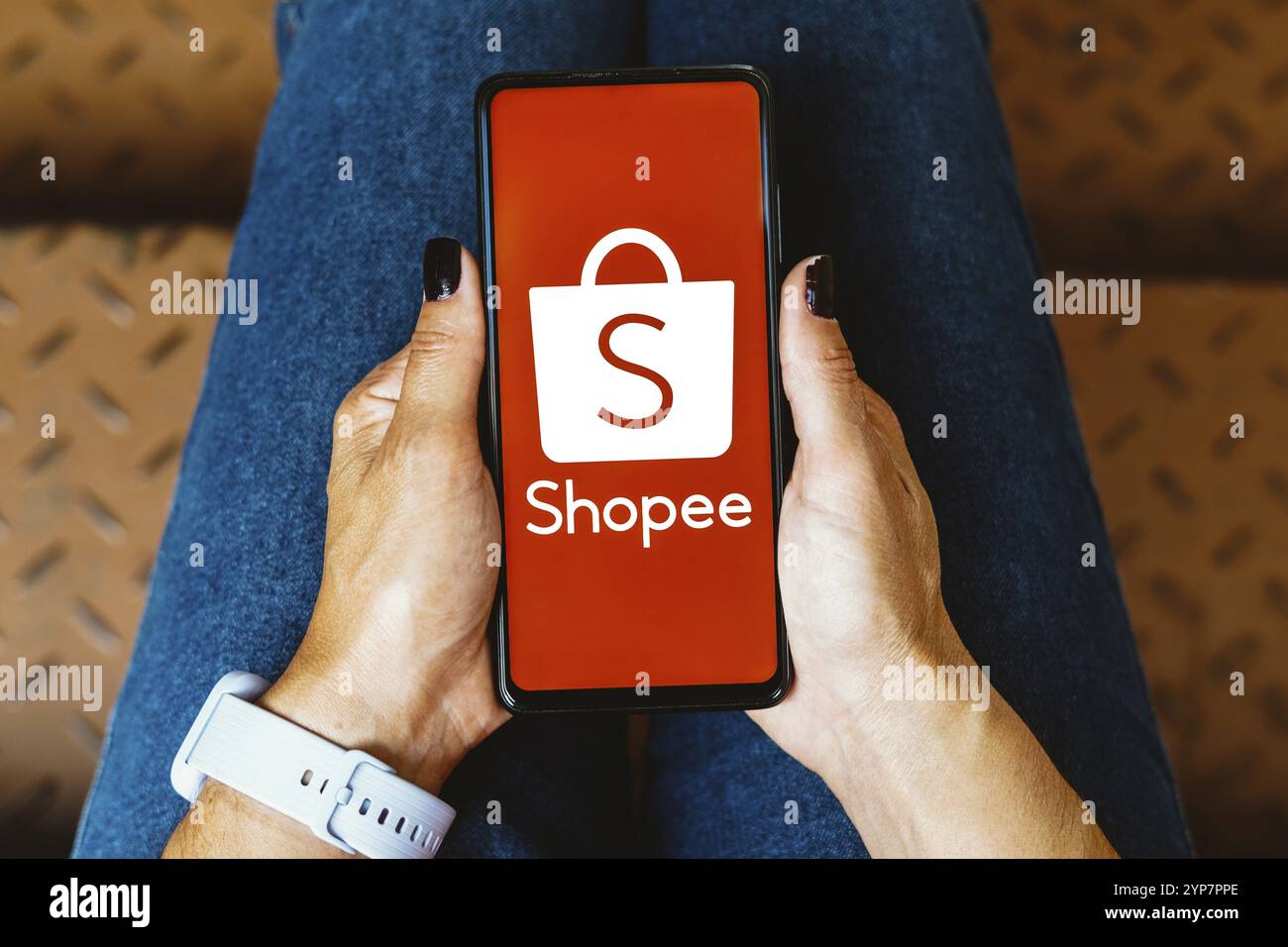 In this photo illustration, the Shopee logo is displayed on a ...