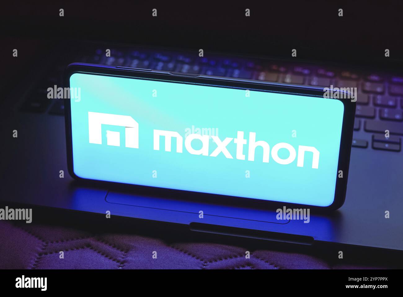 In this photo illustration, the Maxthon logo is displayed on a ...