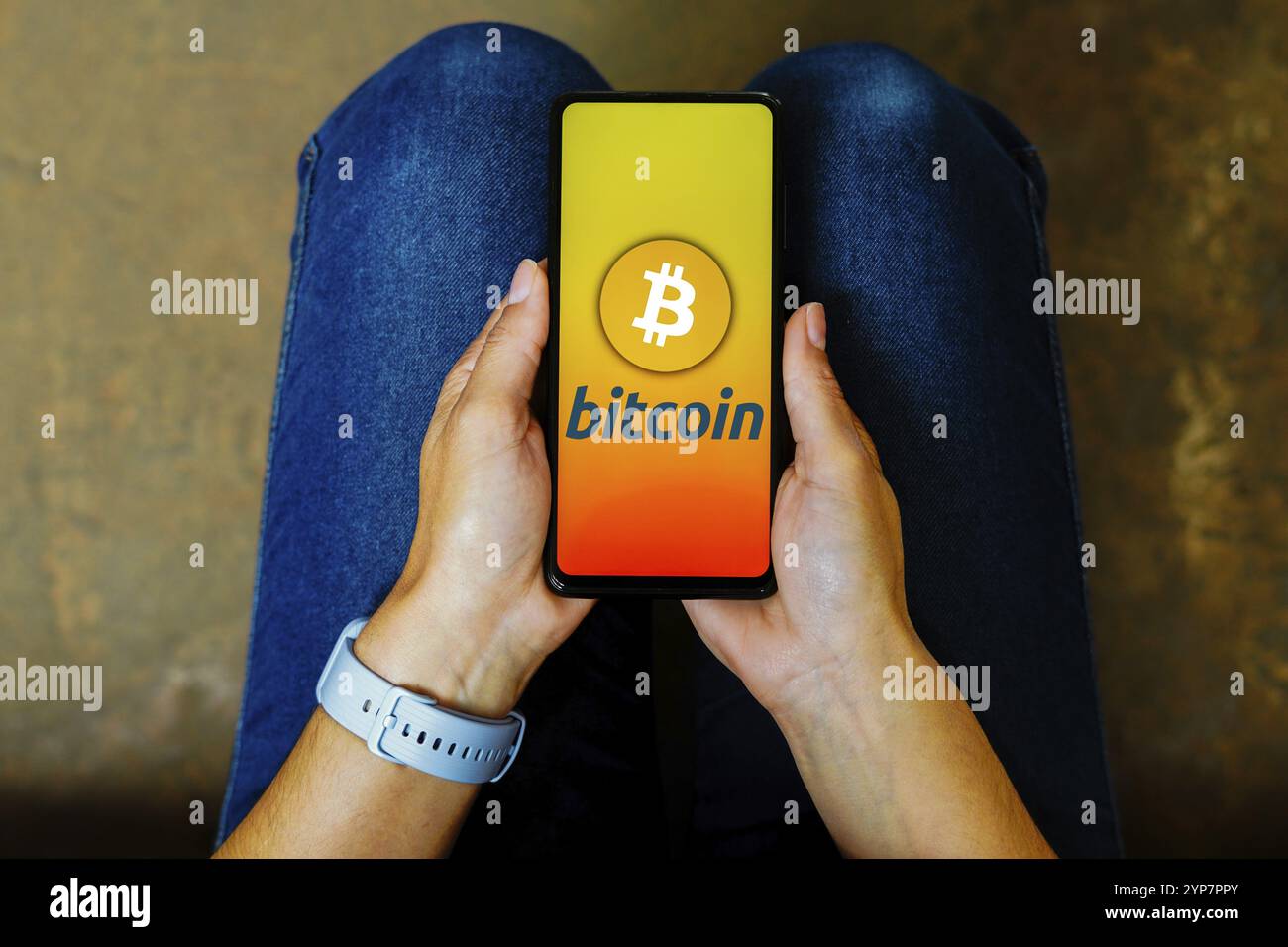 In this photo illustration, the Bitcoin logo is displayed on a ...