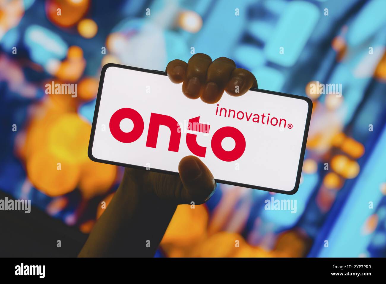 In this photo illustration, the Onto Innovation logo is displayed on a ...