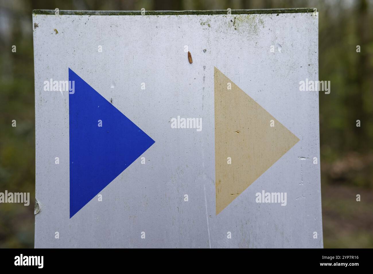 Directional arrows on metal plate Stock Photo - Alamy