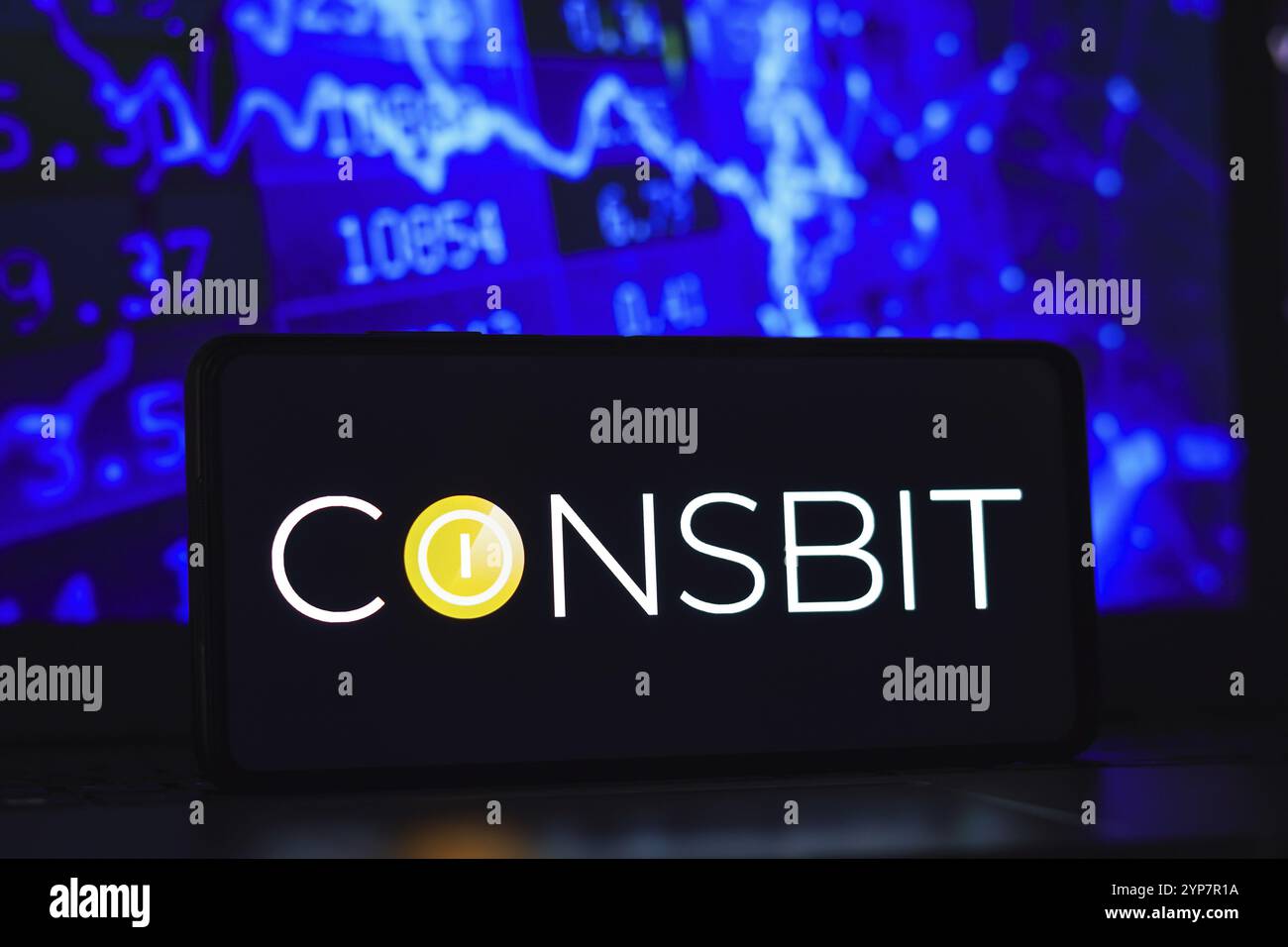 In this photo illustration, the Coinsbit Exchange logo seen displayed ...