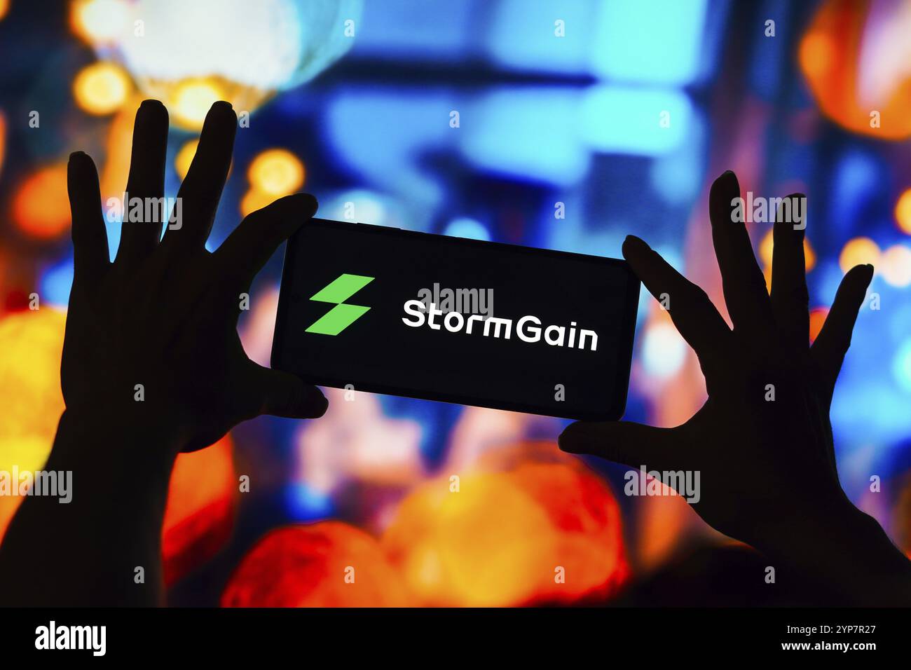 In this photo illustration, the StormGain logo seen displayed on a ...