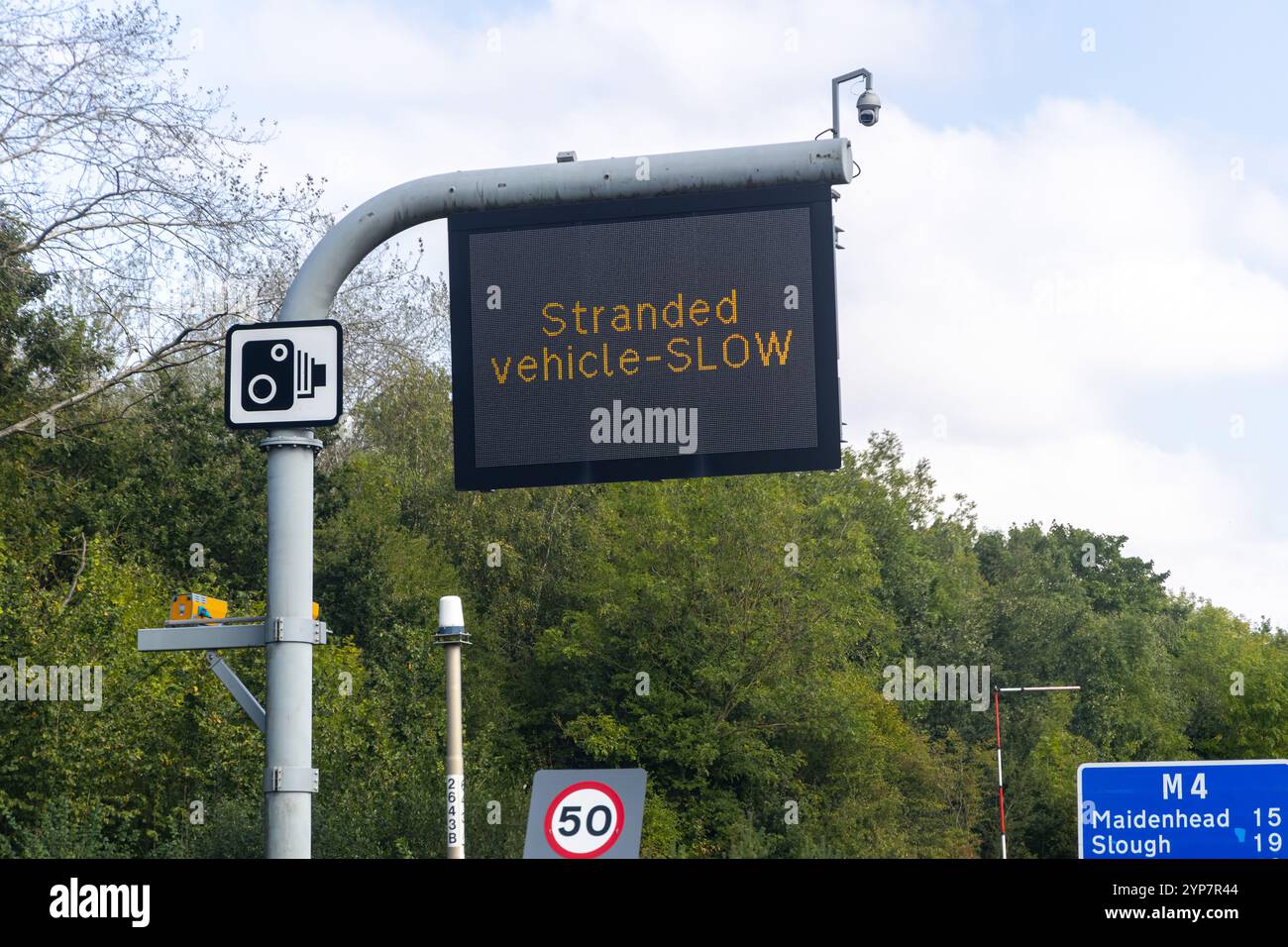 London, UK- September 19, 2024: Road sign warns of stranded vehicle and ...