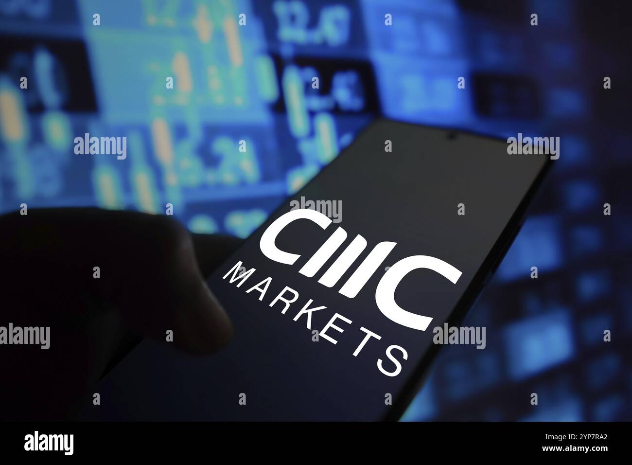 In this photo illustration, the CMC Markets logo is displayed on a ...
