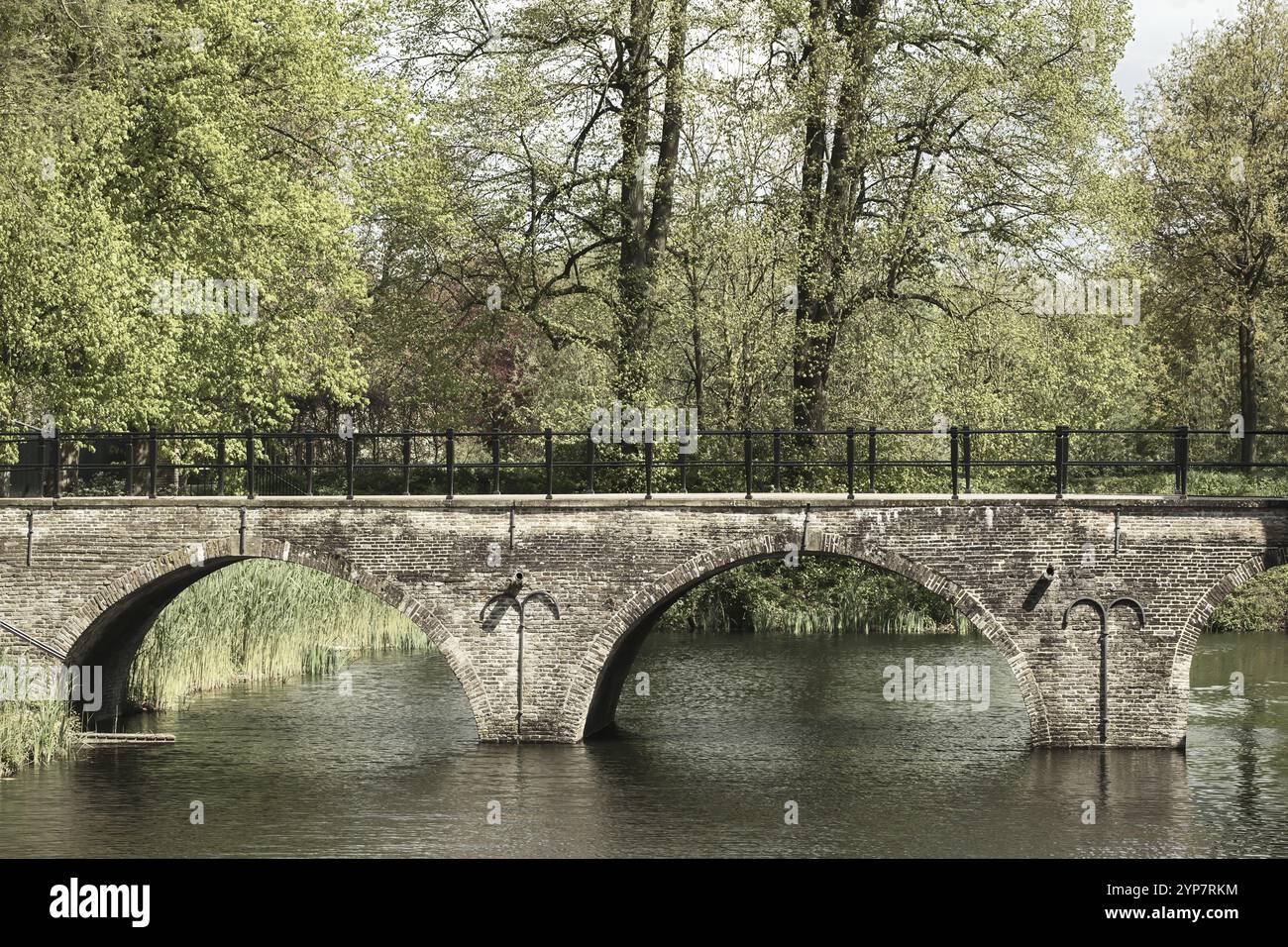 Old stone bridge over the canal Stock Photo - Alamy