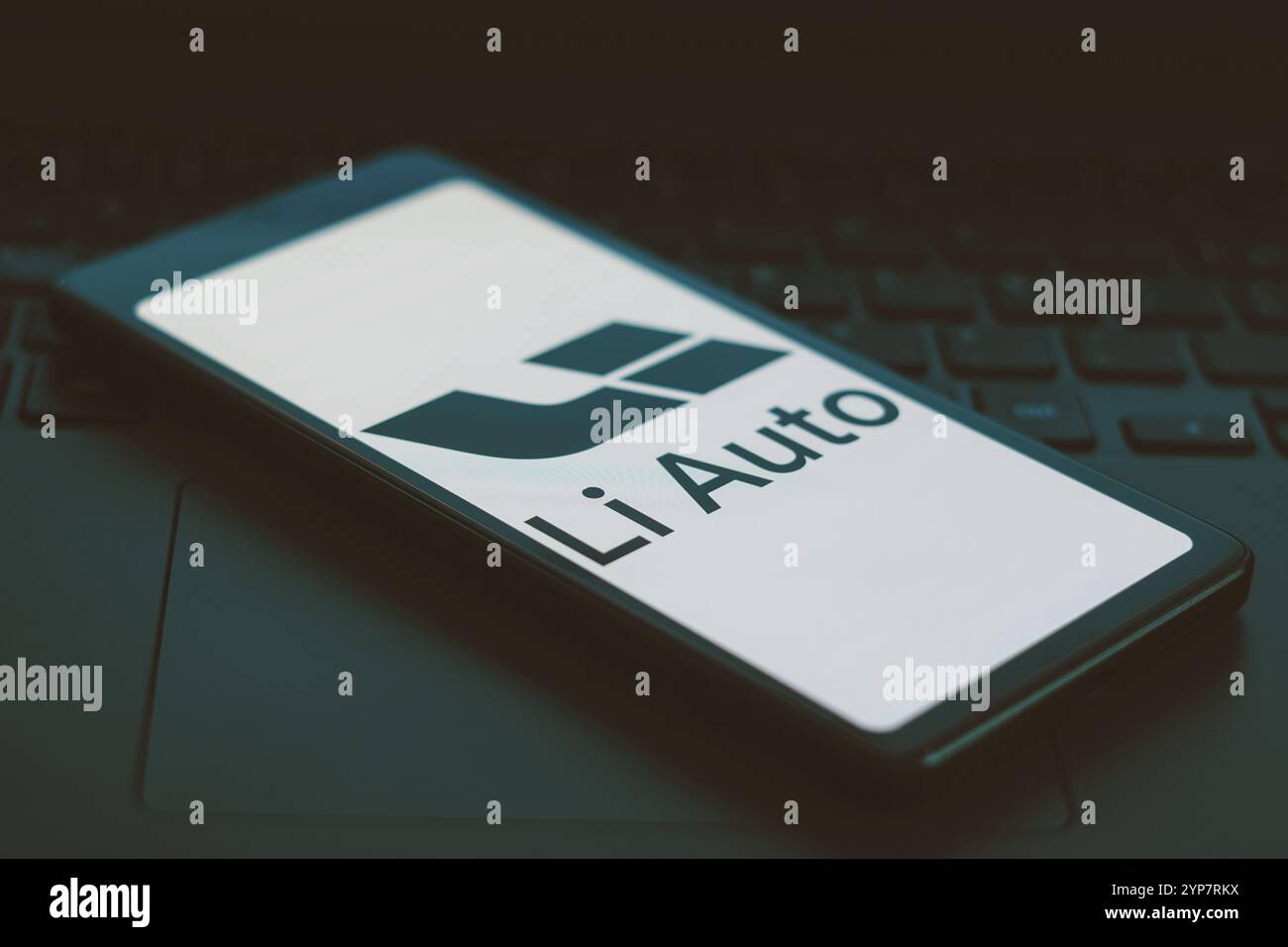 In this photo illustration, the Li Auto logo is displayed on a ...