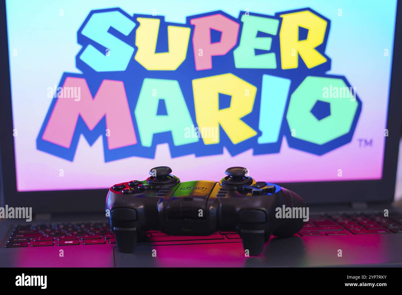 In this photo illustration, the Super Mario logo game is displayed on a ...