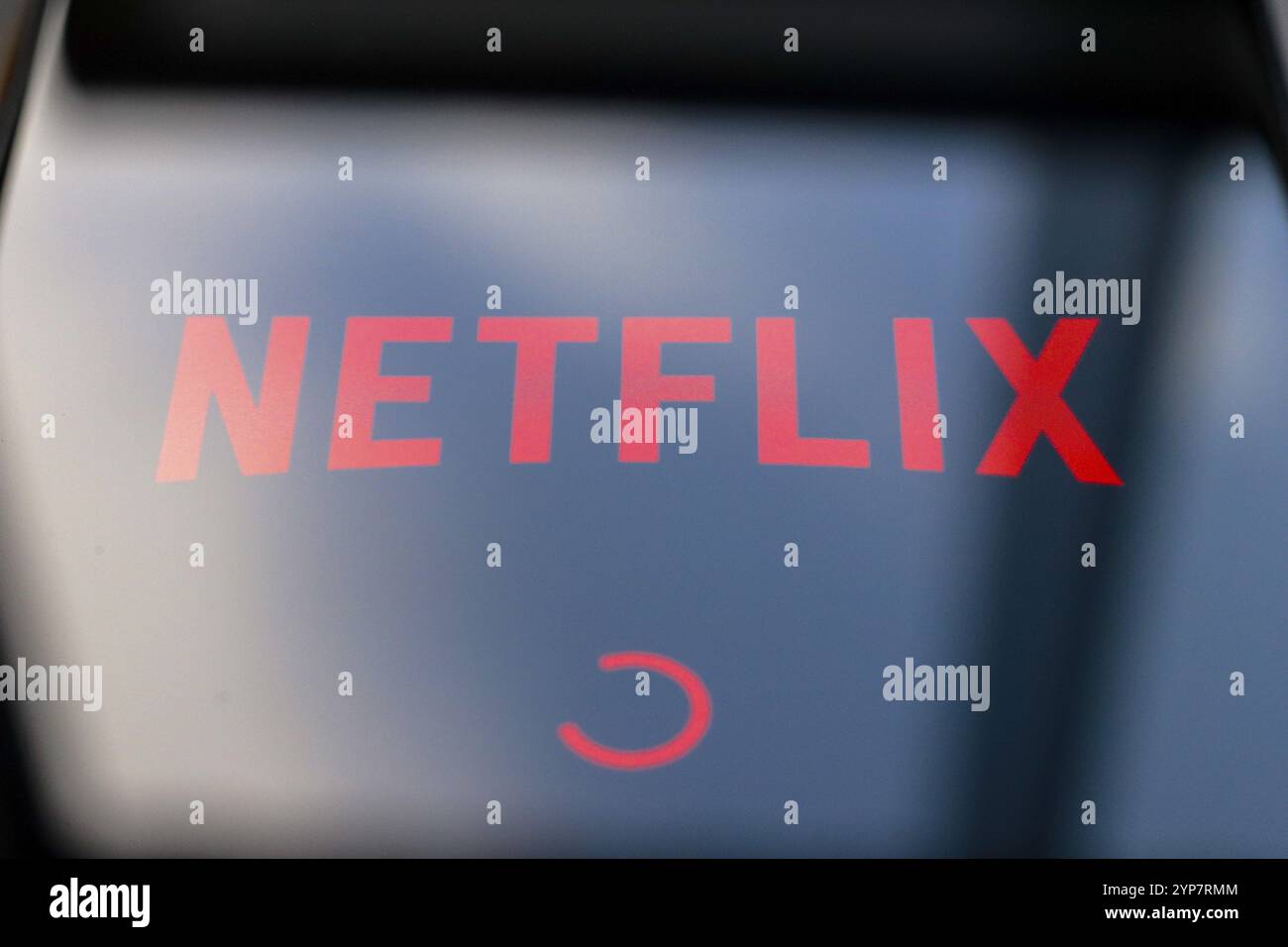 In this photo illustration, the Netflix streaming app logo is displayed ...