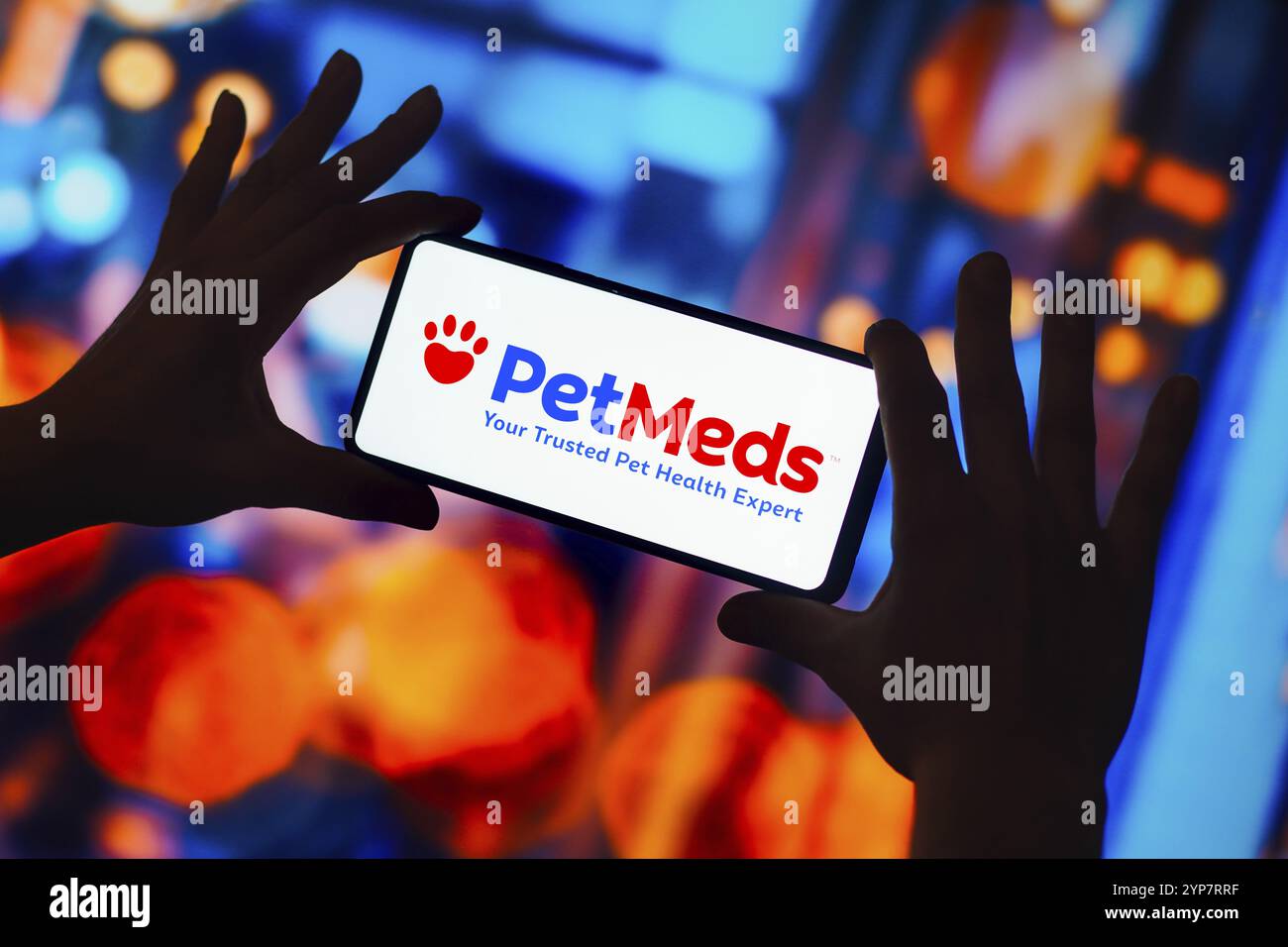 In this photo illustration, the PetMed Express logo is displayed on a ...