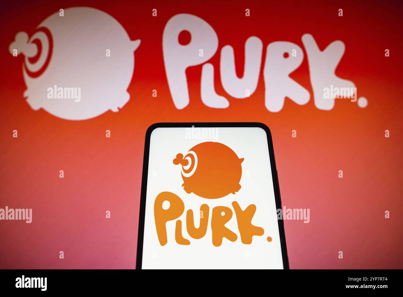 In this photo illustration, the Plurk logo is displayed on a smartphone screen Stock Photo - Alamy