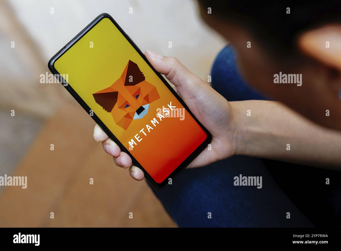 In this photo illustration, the MetaMask logo is displayed on a ...