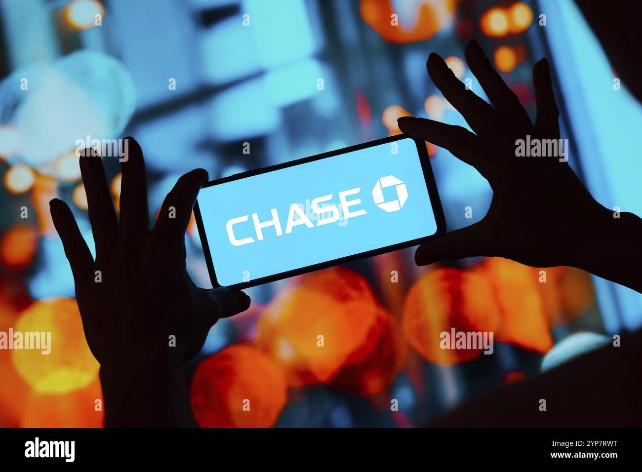 In this photo illustration, the Chase Bank logo is displayed on a ...