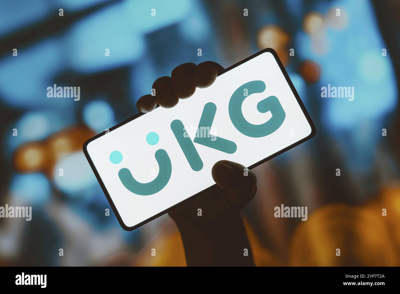 In this photo illustration, the UKG logo is displayed on a smartphone ...
