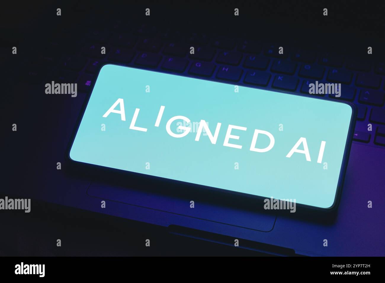 In this photo illustration, the Aligned AI logo is displayed on a smartphone screen Stock Photo ...
