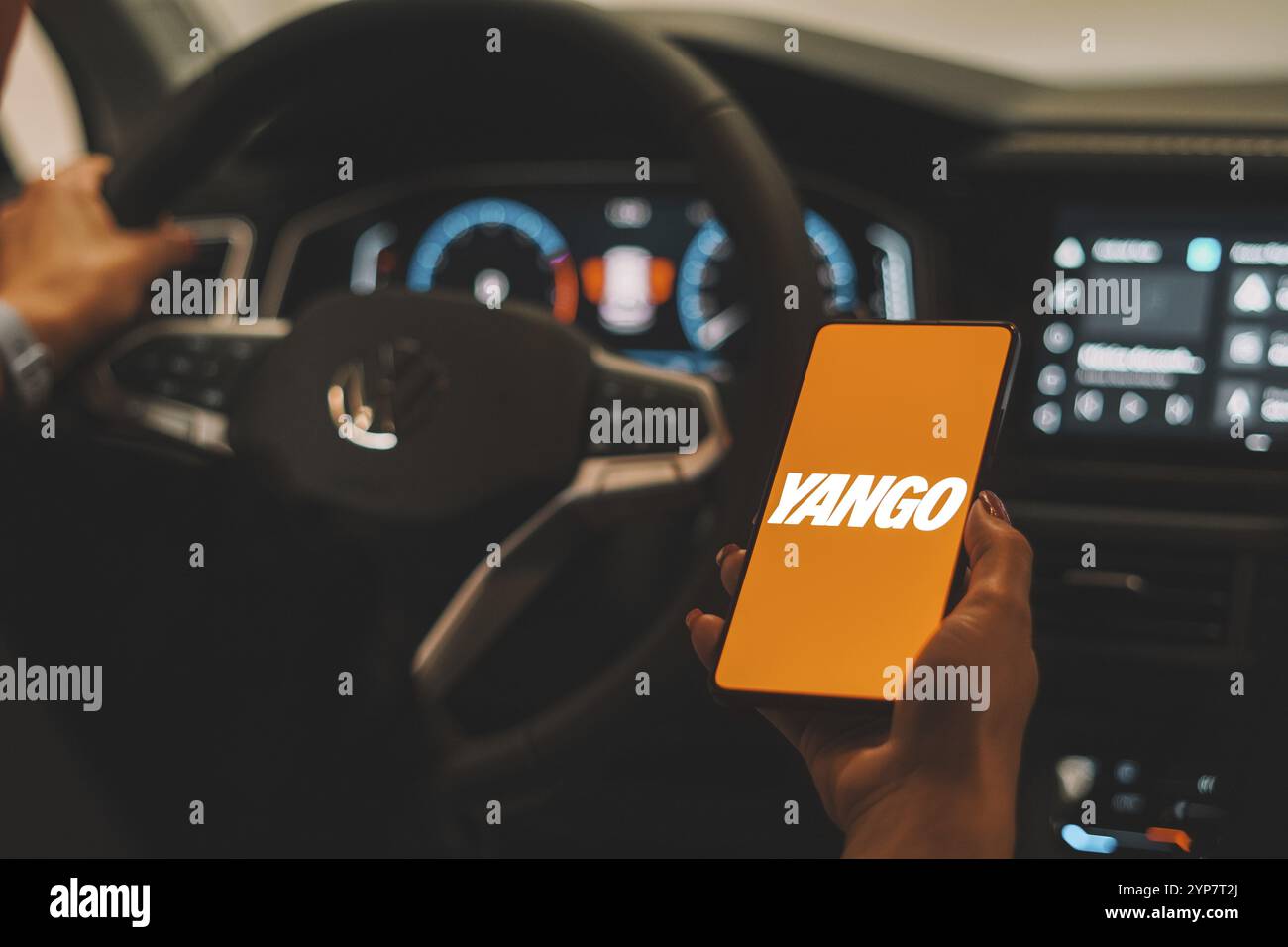 In this photo illustration, the Yango logo is displayed on a smartphone ...