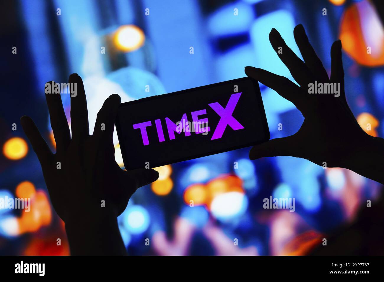 In this photo illustration, the TimeX logo seen displayed on a ...