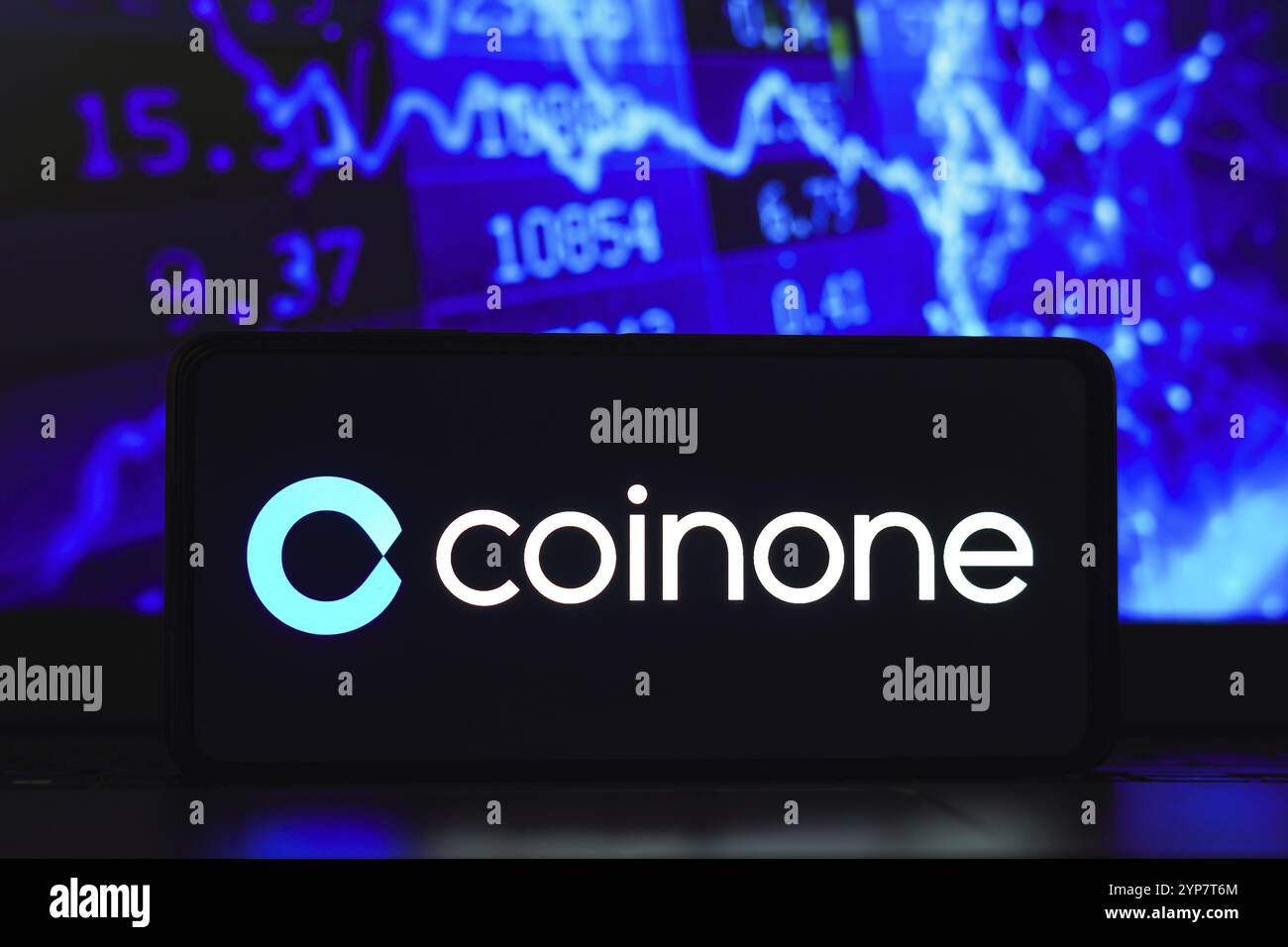 In this photo illustration, the Coinone Exchange logo seen displayed on a smartphone Stock Photo ...