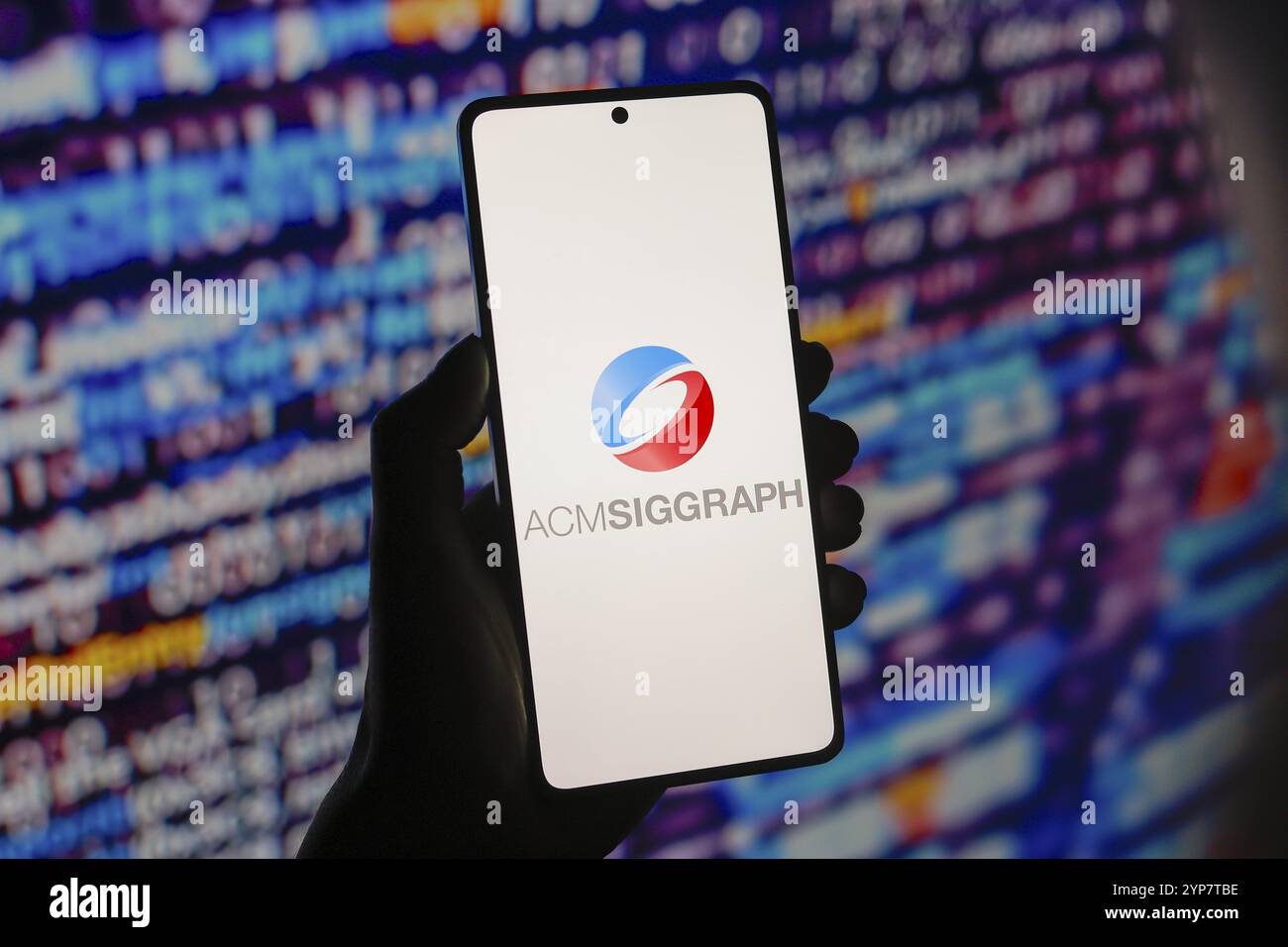 In this photo illustration, the ACM SIGGRAPH logo is displayed on a smartphone screen Stock ...