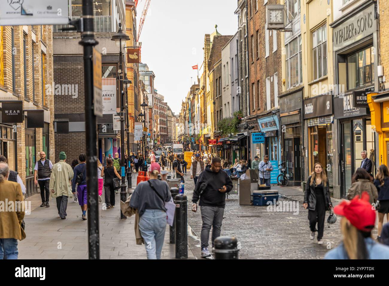 London, UK- September 19, 2024: Vibrant Soho London street scene with ...
