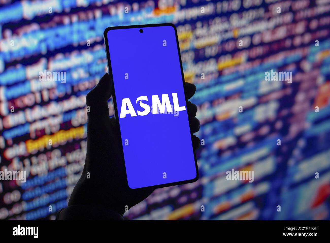 In this photo illustration, the ASML Holding logo is displayed on a ...