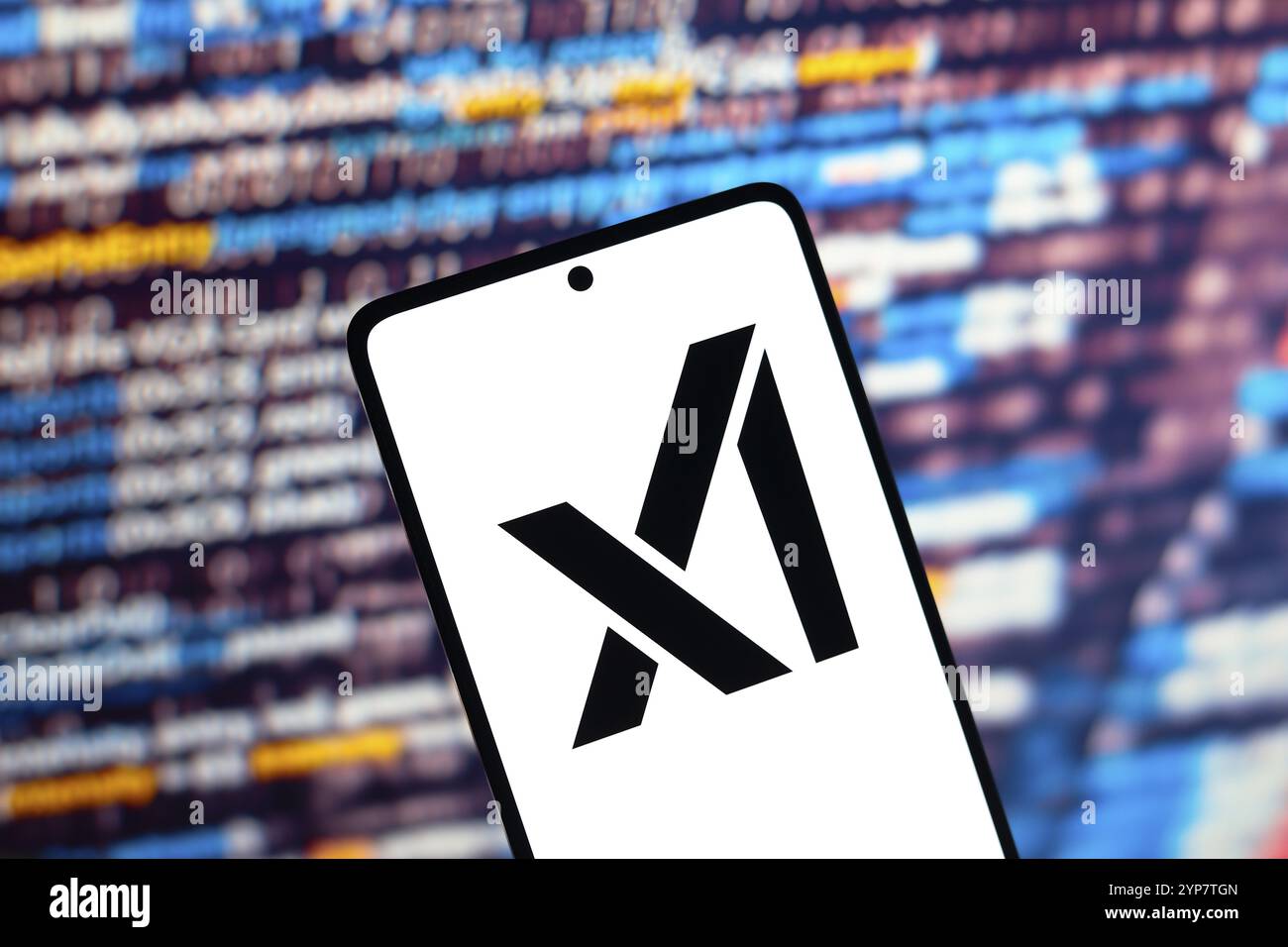 In this photo illustration, the xAI logo is displayed on a smartphone ...